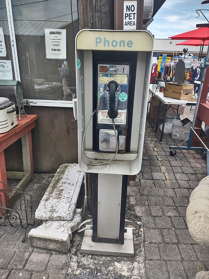This vintage payphone stands as a charming relic from the pre-smartphone era, when "phone a friend" meant having quarters and patience.
