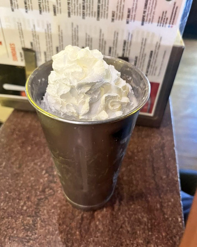 This isn't just a milkshake; it's a commitment. Thick enough to stand a spoon in, topped with whipped cream that defies gravity.