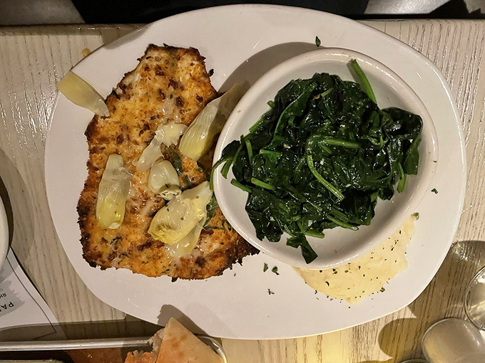 Pecan-crusted rainbow trout with saut&eacute;ed spinach &ndash; proof that "healthy choice" and "absolutely delicious" aren't mutually exclusive concepts.