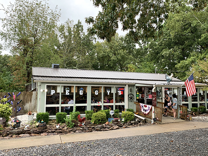 Peggy Sue's Place embodies small-town charm with its rustic exterior and American flag &ndash; the kind of spot where regulars don't need menus.