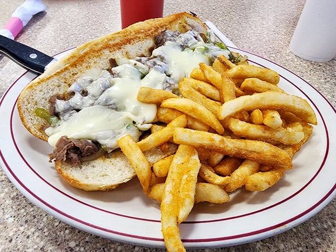 The Philly cheesesteak&mdash;meat and cheese melding into sandwich perfection with fries so golden they deserve their own Fort Knox.