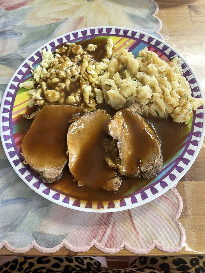 Sauerbraten that's been marinated, slow-cooked, and lovingly smothered in gravy. Fork-tender meat that's having a very serious conversation with those potatoes.