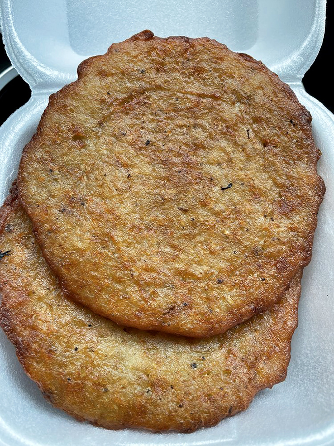 Potato pancakes that could make hash browns file for unemployment&mdash;golden, crispy discs of potato perfection waiting for their applesauce companion.
