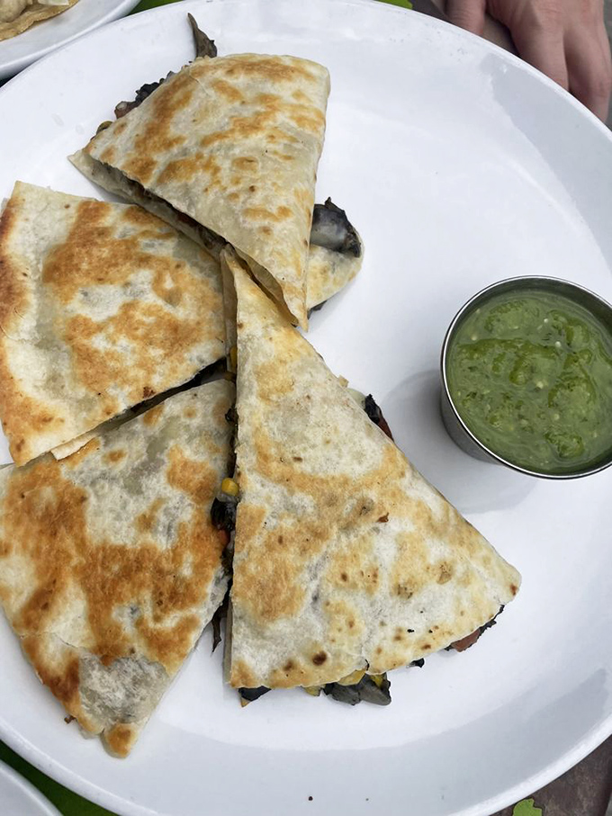 Not every treasure at Corner Bistro has beef. This quesadilla brings the cheese pull drama without stealing the burger's spotlight.