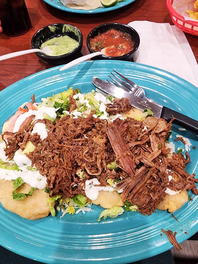 Slow-cooked carnitas piled high on handmade tortillas—the kind of dish that makes you close your eyes and momentarily forget you're in Connecticut.