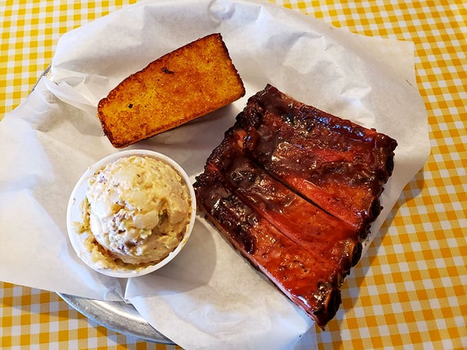 Ribs that make you contemplate moving to Salinas. That glistening lacquer on perfectly smoked pork with potato salad and cornbread is the ultimate power trio.