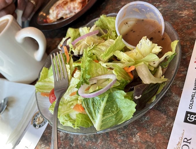 A garden-fresh side salad with house dressing&mdash;the diner's way of saying, "Yes, we care about vegetables too," while still keeping things deliciously unpretentious.