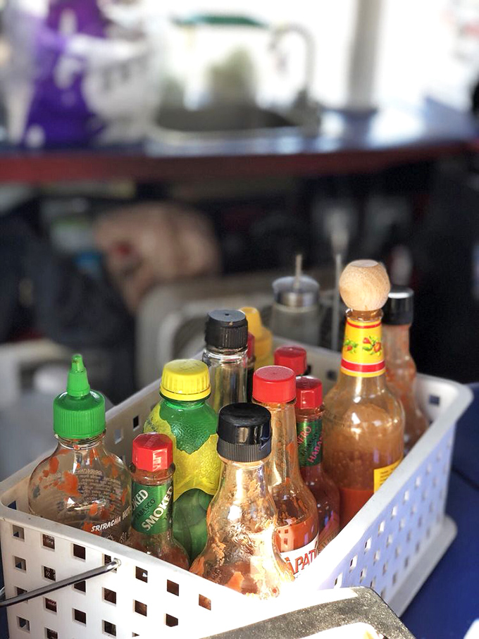The condiment caddy: where hot sauce enthusiasts can customize their Bowpicker experience with a splash of liquid personality.