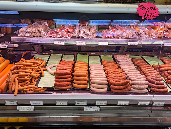 The butcher case at Kuby's is a carnivore's dream canvas &ndash; each sausage link a masterpiece of meat artistry waiting to be taken home.