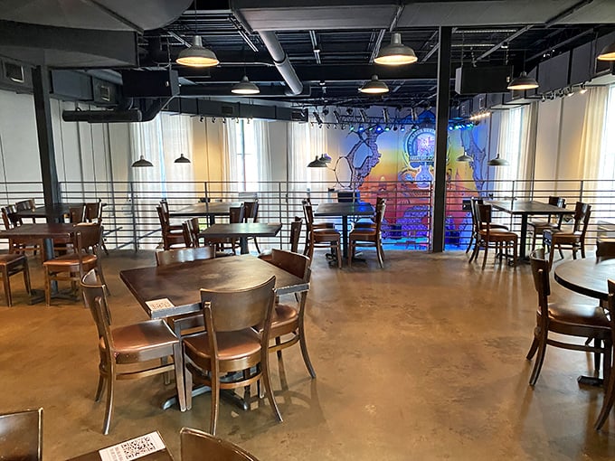 Industrial-chic meets Southern hospitality in this upstairs dining area where exposed pipes and warm wood create conversation-worthy ambiance.