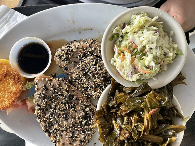 Sesame-crusted tuna with sides that don't just complement—they compete for your attention. A plate that's both art and sustenance.