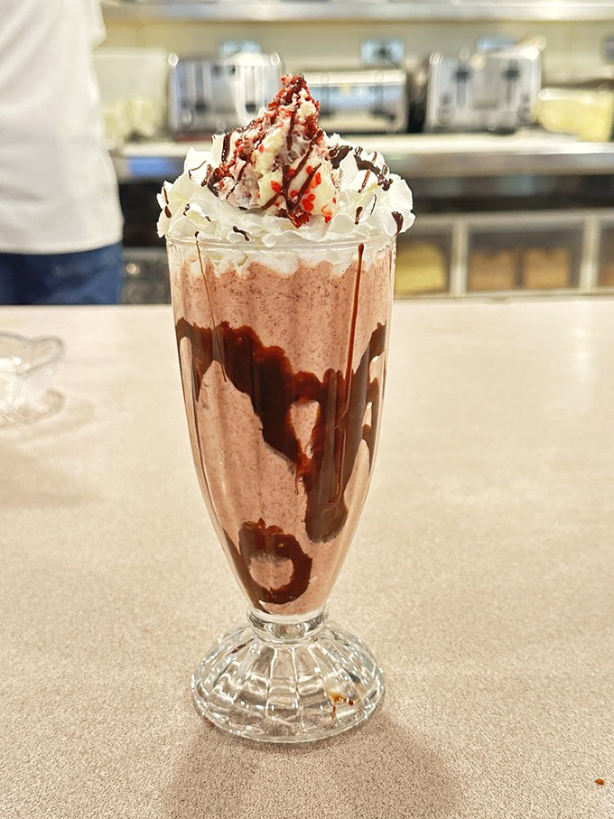 This isn't just a chocolate shake &ndash; it's a tower of indulgence that makes you question why anyone would ever order anything else.