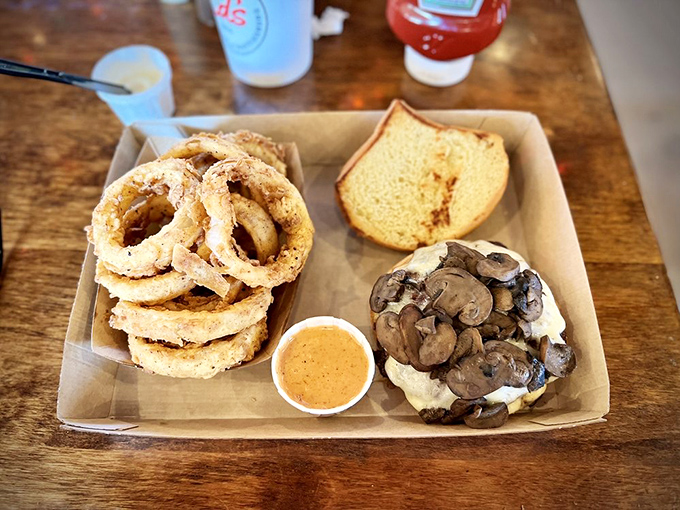 The Shroom Burger with onion rings demonstrates that mushrooms and beef were destined for each other like Bogart and Bacall. 