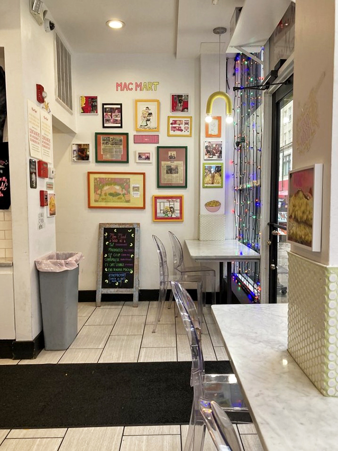 The cozy dining nook features colorful framed memories on the wall and twinkling lights that say, "Stay awhile."