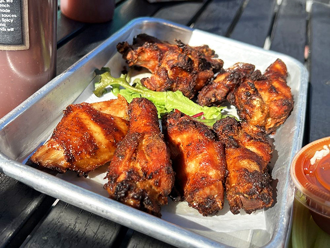 Smoked wings with a bark that would make BBQ pitmasters weep with joy. These aren't just wings&mdash;they're smoky, sticky masterpieces of backwoods culinary art.