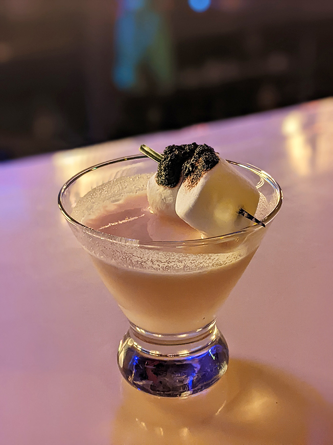 This s'more-inspired cocktail comes with its own toasted marshmallow. Dessert and drink in one? That's what I call efficient indulgence!