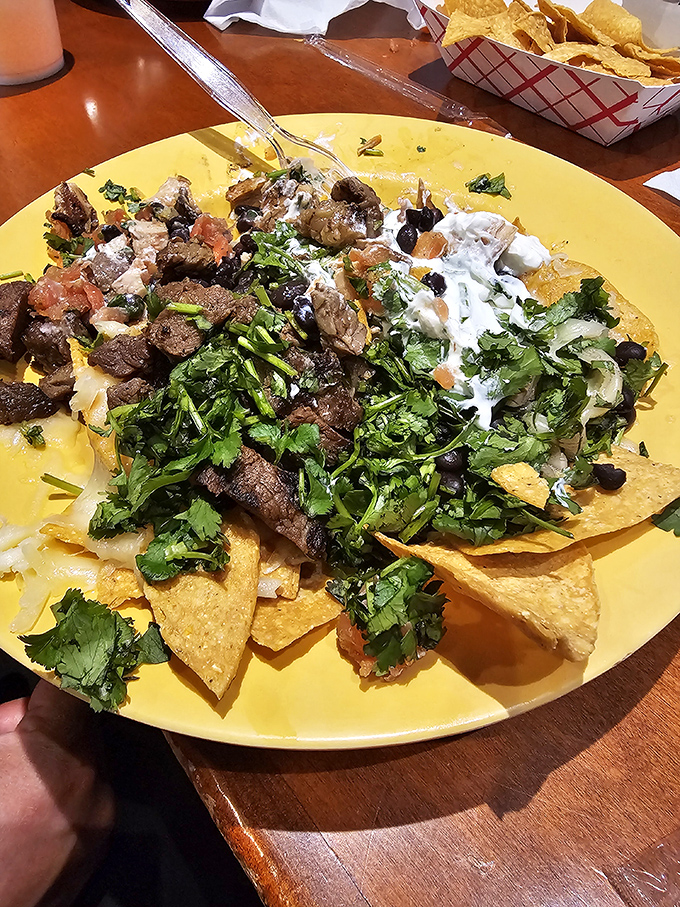 Nachos that require a strategy to eat. Like a delicious game of Jenga, every move must be calculated to maximize that perfect bite.