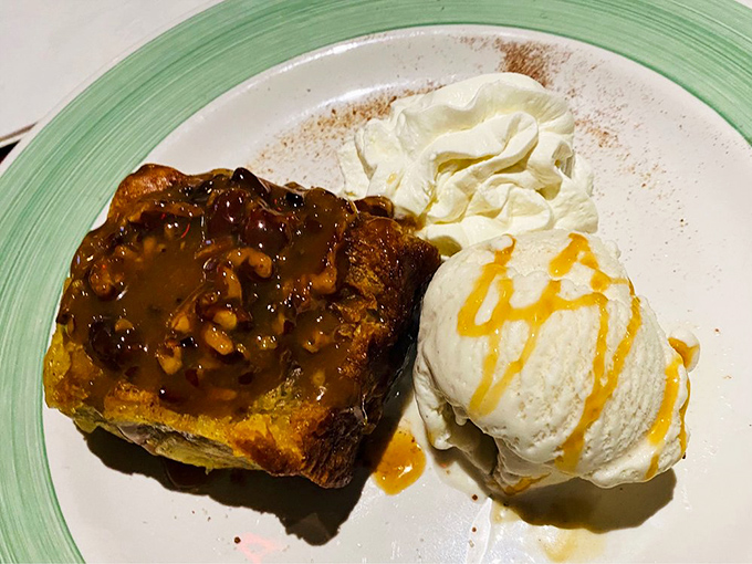 Sticky bun bread pudding that makes you question why you ever save room for dessert. The vanilla ice cream melting into warm caramel is pure theater.