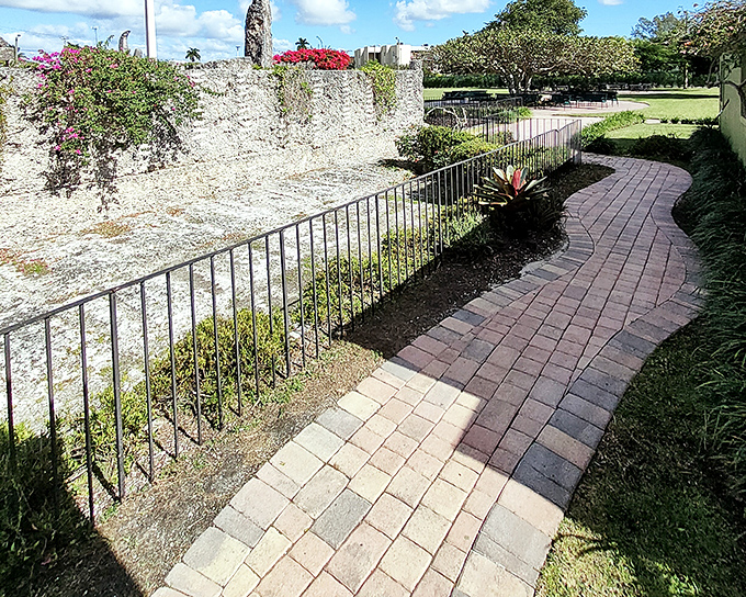 The winding stone pathway guides visitors through the grounds, like a yellow brick road made of limestone leading to wonderfully weird treasures.