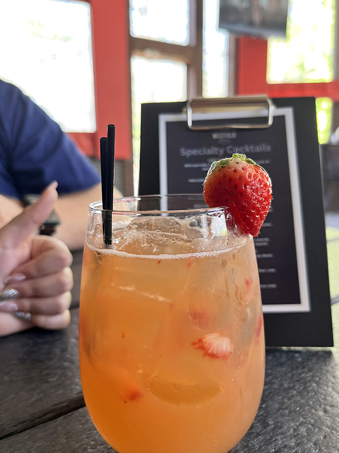 A strawberry cocktail that tastes like summer vacation in a glass, complete with fresh fruit that counts as your daily serving, right?
