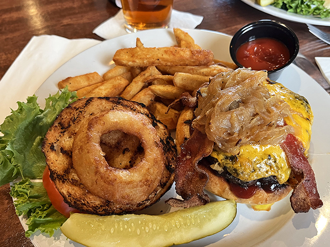 This isn't just a burger &ndash; it's an architectural achievement with an onion ring crown that demands respect before the first magnificent bite.