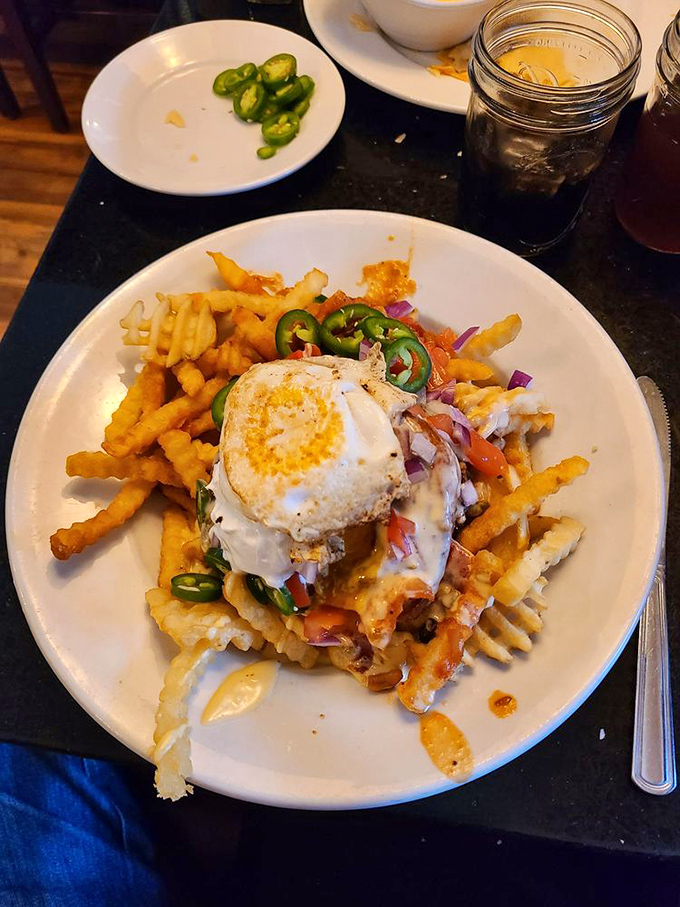 Breakfast meets lunch in holy matrimony. That fried egg on top isn't just showing off&mdash;it's creating a sauce within a sauce.