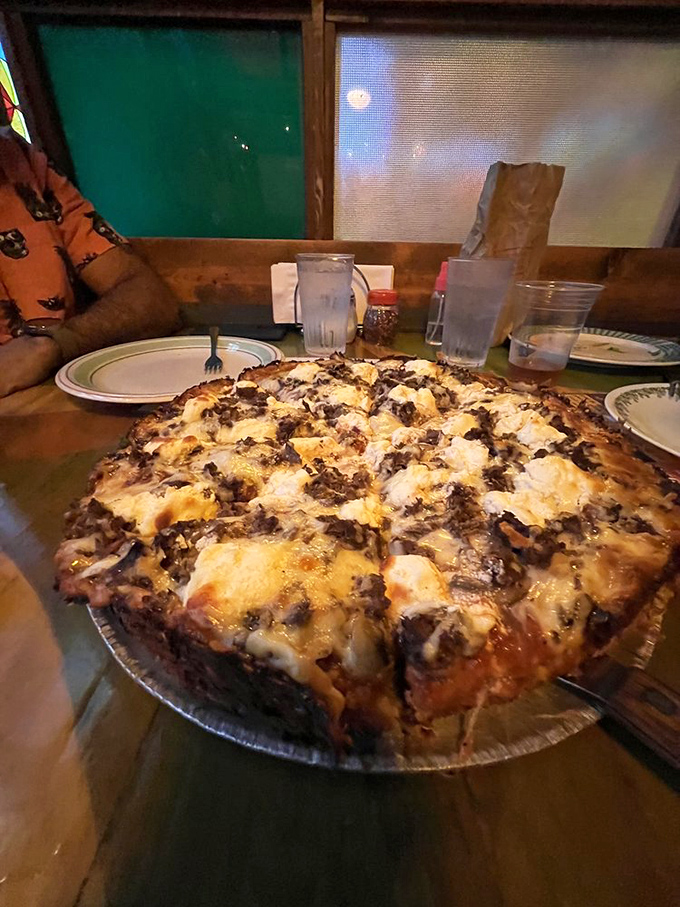 A deep-dish dream that defies gravity. This mountain of cheese, sauce, and toppings isn't just food&mdash;it's an engineering achievement worthy of NASA recognition.