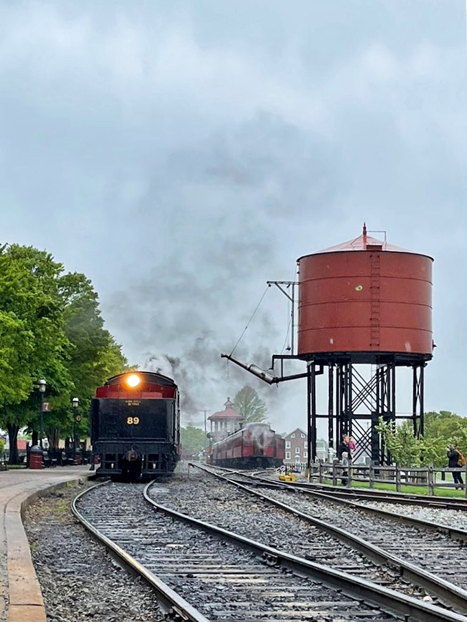 The iconic water tower stands like a sentinel of steam-era technology, while Engine No. 89 prepares for another journey through time.