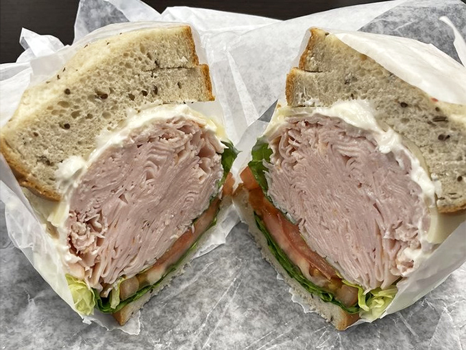 Turkey stacked higher than your weekend reading pile. This sandwich doesn't just satisfy hunger—it obliterates it with military precision.