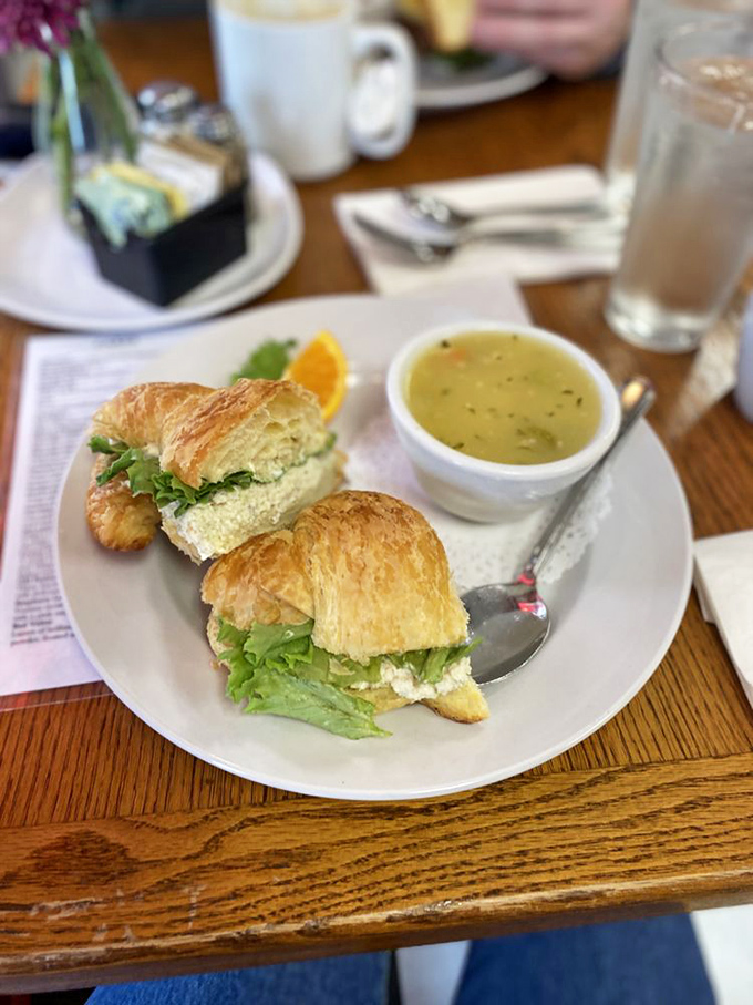A croissant sandwich and soup combo that makes you momentarily forget you came for dessert—but only momentarily.