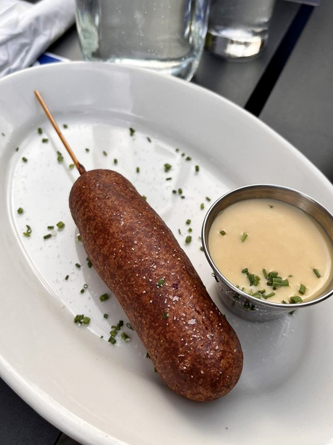 Not just any corn dog&mdash;a gourmet revelation on a stick. The accompanying sauce elevates this carnival classic to something worthy of white tablecloths.