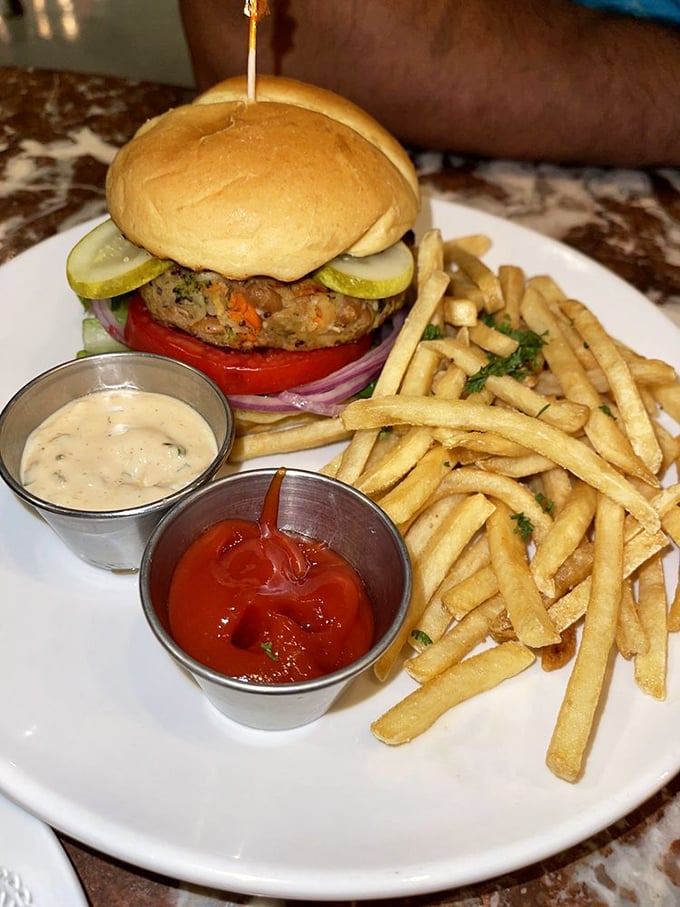 Their veggie burger proves plant-based dining can be hearty, satisfying, and absolutely delicious for every palate type.