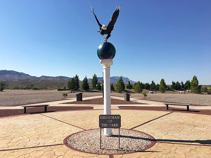 "Guardian of the Park" stands sentinel under that endless New Mexico sky. An eagle perched atop the world—symbolism doesn't get more American.