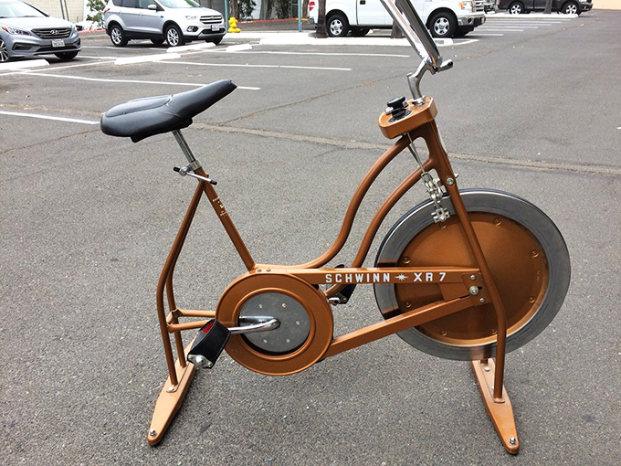 A vintage exercise bike that probably witnessed more New Year's resolutions than a gym membership salesperson.
