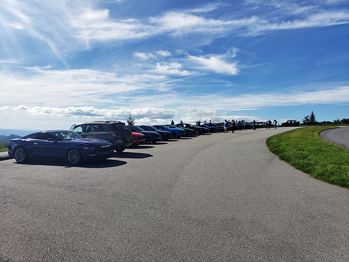 Car enthusiasts gather where horsepower takes a backseat to mountain majesty. Even luxury vehicles know when they've been upstaged.