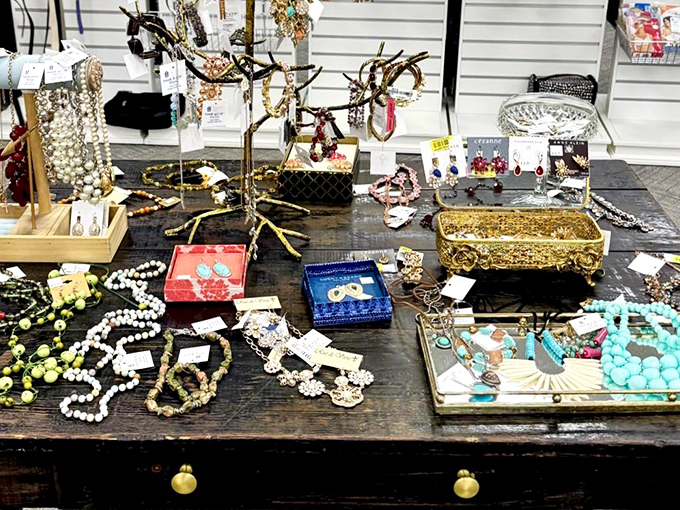 Jewelry displayed like an elegant yard sale hosted by your stylish aunt who traveled the world and brought back stories with each piece.