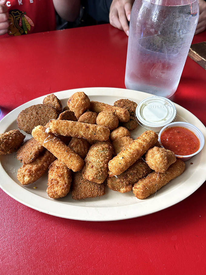 This isn't just an appetizer plate&mdash;it's a golden, crispy prelude to pizza greatness. Patience is easier with fried goodness to tide you over.