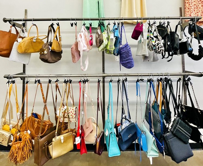 Handbag heaven! From practical totes to statement clutches, the accessory wall offers the perfect finishing touch for your secondhand ensemble.