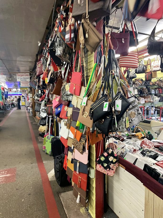 This handbag display creates a rainbow of leather and vinyl possibilities&mdash;proof that somewhere in Fleamasters, there's the perfect purse waiting for you.