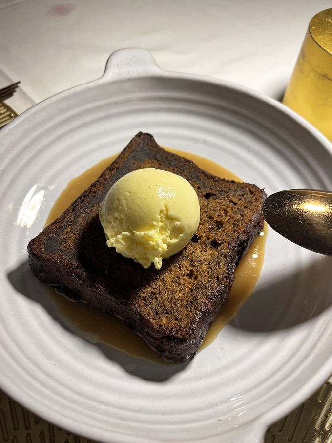 Sticky toffee pudding with ice cream melting into warm cake—a temperature contrast that makes your taste buds do a happy dance.