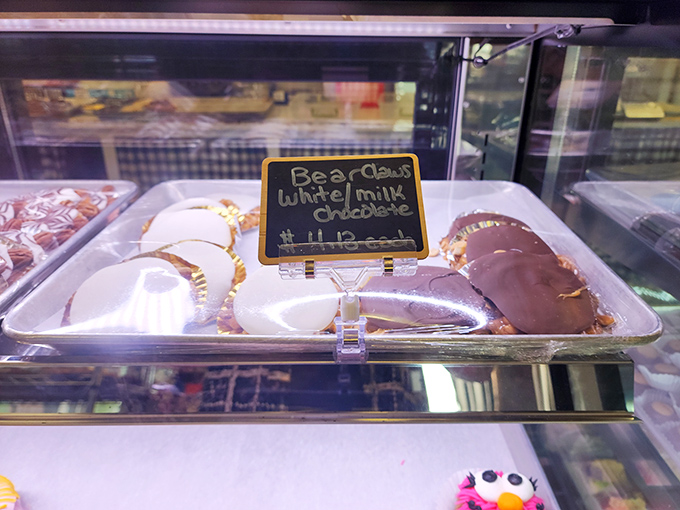 Bear claws lounging in their display case, daring you to find a more satisfying companion to your morning coffee.