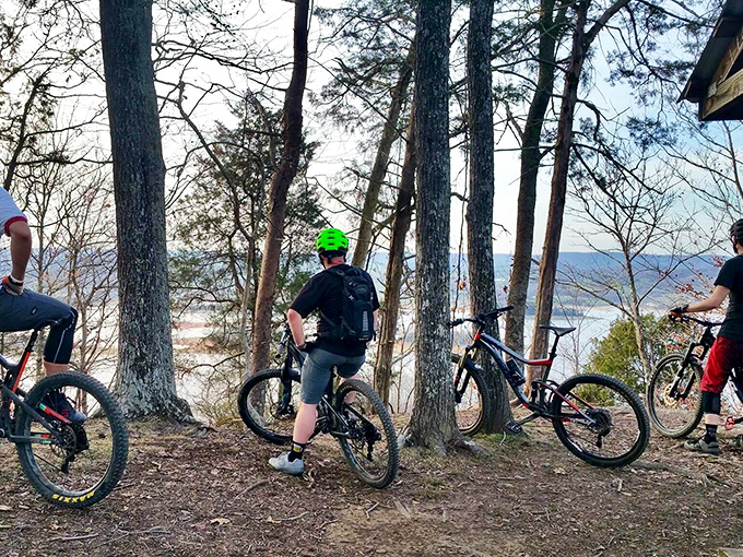 Mountain bikers pause to soak in Cherokee Lake vistas, proving that sometimes the best part of the journey is stopping to enjoy the view.