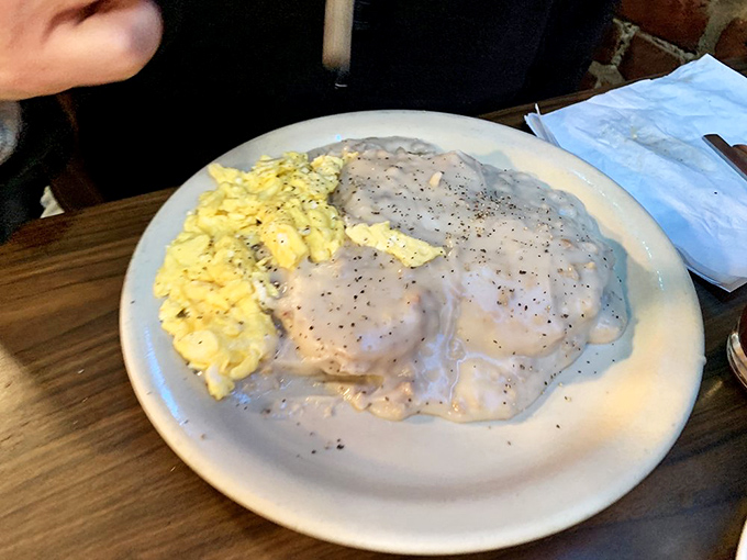 Biscuits and gravy that would make your grandmother nod in approval. That pepper-speckled gravy blankets everything in creamy, savory goodness.