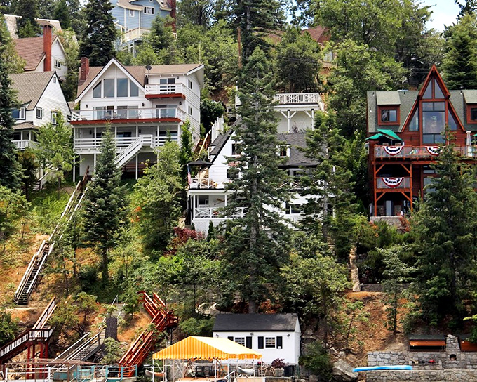 Mountain homes cascade down the hillside like a colorful game of Tetris, each deck competing for the best sunset view.