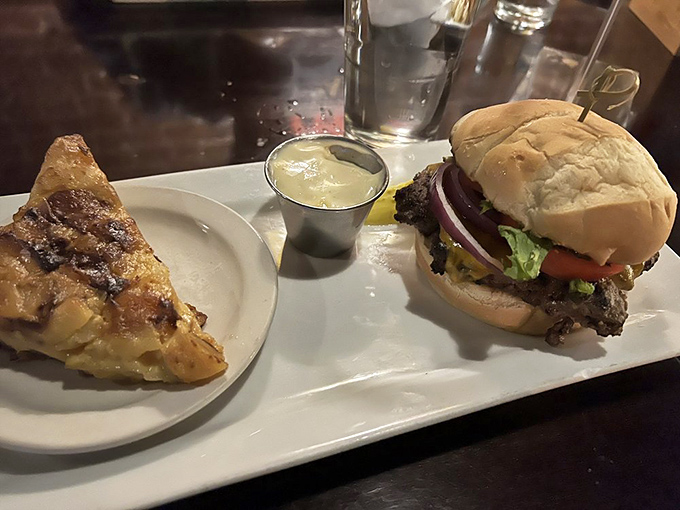 A proper pub burger with what appears to be scalloped potatoes&mdash;proof that not all British food deserves its bland reputation. This is pub grub elevated.
