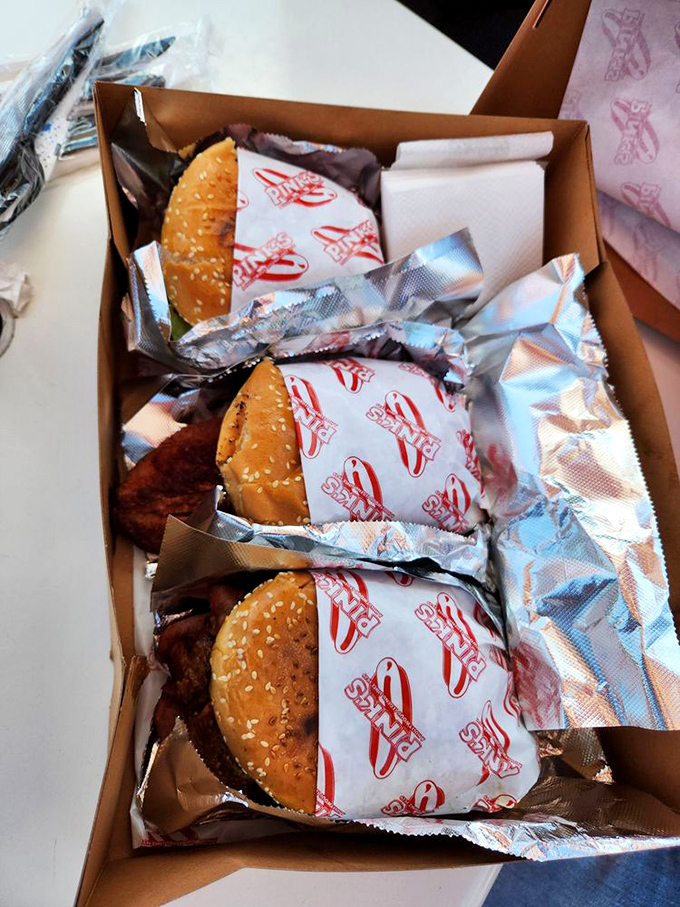 Burgers wrapped like precious gifts, each one promising the kind of satisfaction that creates lifelong customer loyalty.