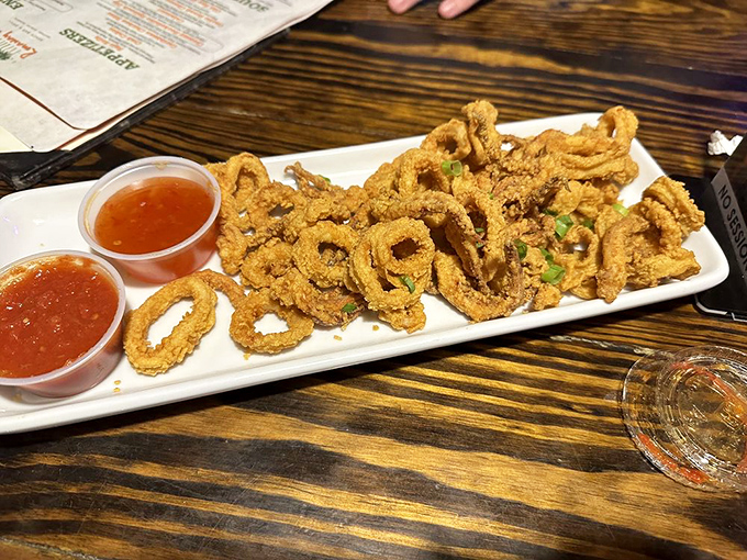 Calamari so perfectly golden and crispy, even people who say "I don't like calamari" will be reaching across the table for more.