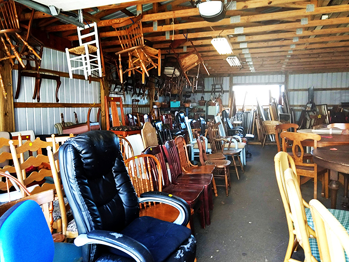 The chair section resembles a furniture family reunion—mid-century modern mingles with colonial classics while office chairs network in the corner.