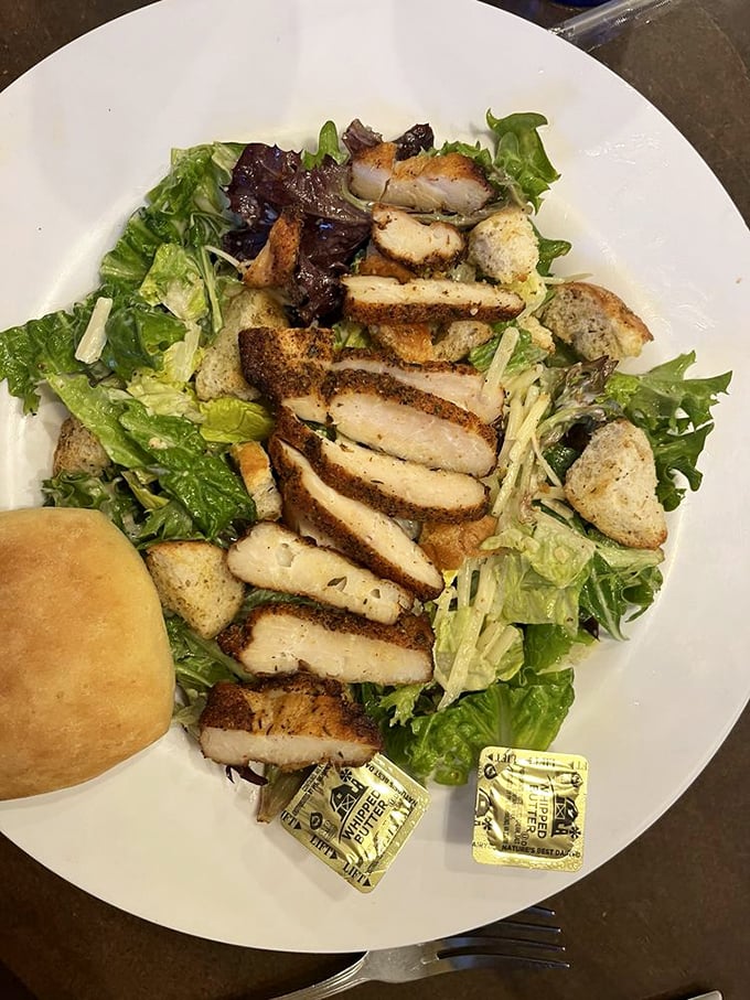 A chicken Caesar salad that actually satisfies, with perfectly seasoned blackened chicken and house-made croutons that deserve their own fan club.