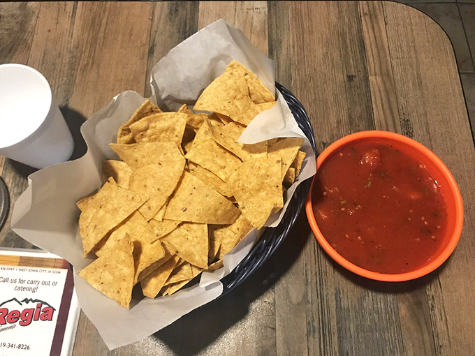 Freshly fried tortilla chips and vibrant salsa&mdash;the opening act that sets the stage. This isn't just a pre-meal snack; it's a statement of intent.